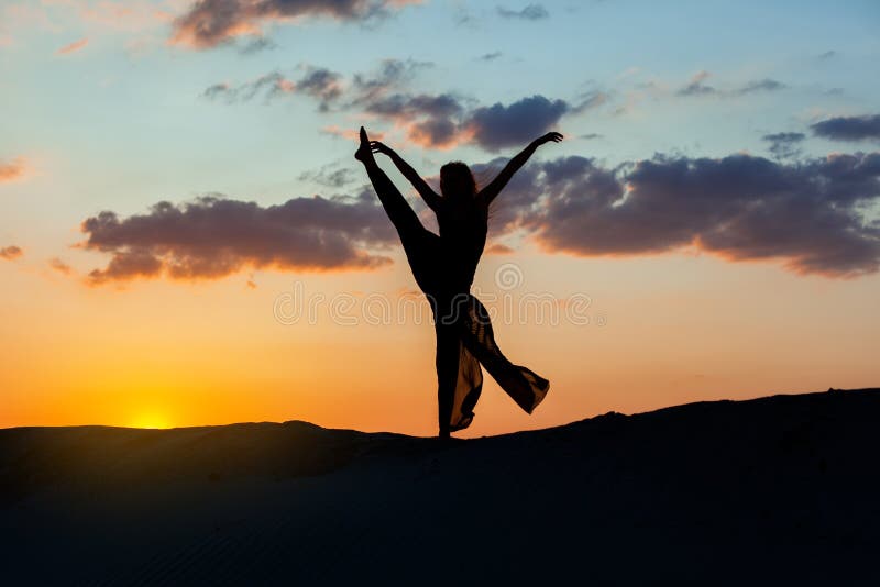 Woman dancing at sunset. stock image. Image of lifestyle - 100297361