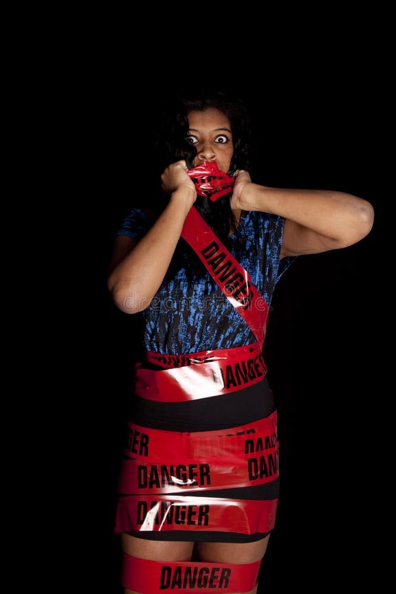 Woman in Danger Tape Scared Stock Image - Image of legs, adult: 18614573