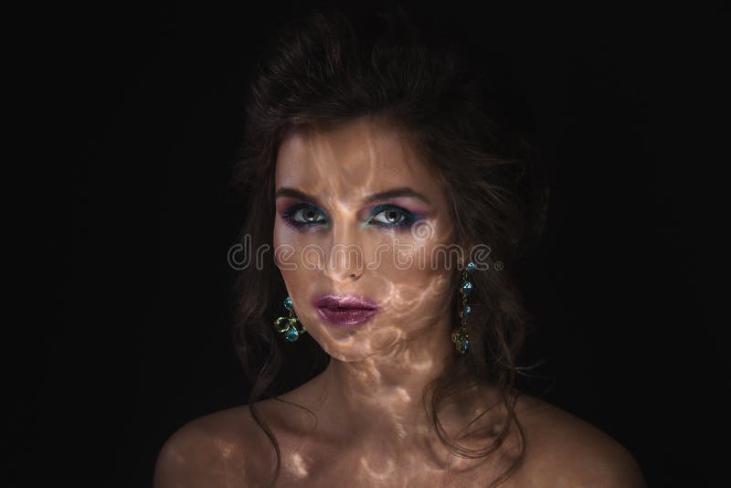 Woman in Darkness with a Light Reflection on Her Face Stock Image ...