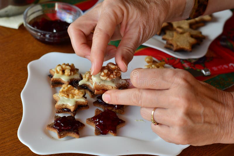 Woman is Decorating Cookies for Christmas. Stock Photo - Image of ...