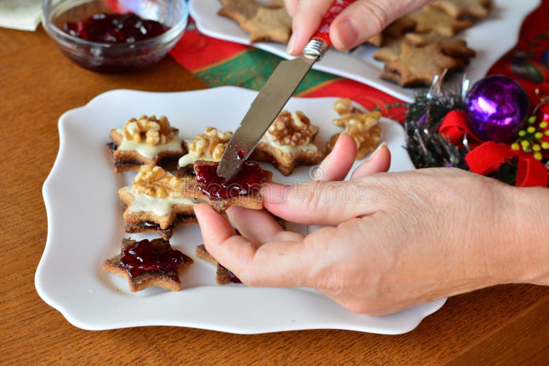 Woman is Decorating Cookies for Christmas. Stock Photo - Image of ...