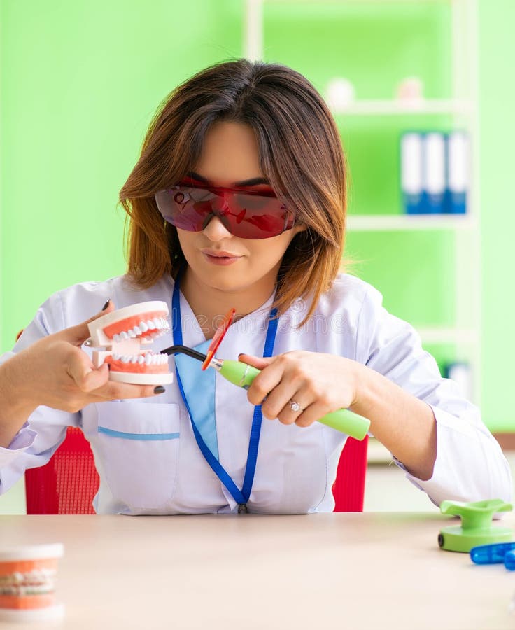 Woman Dentist Working on Teeth Implant Stock Image - Image of care ...