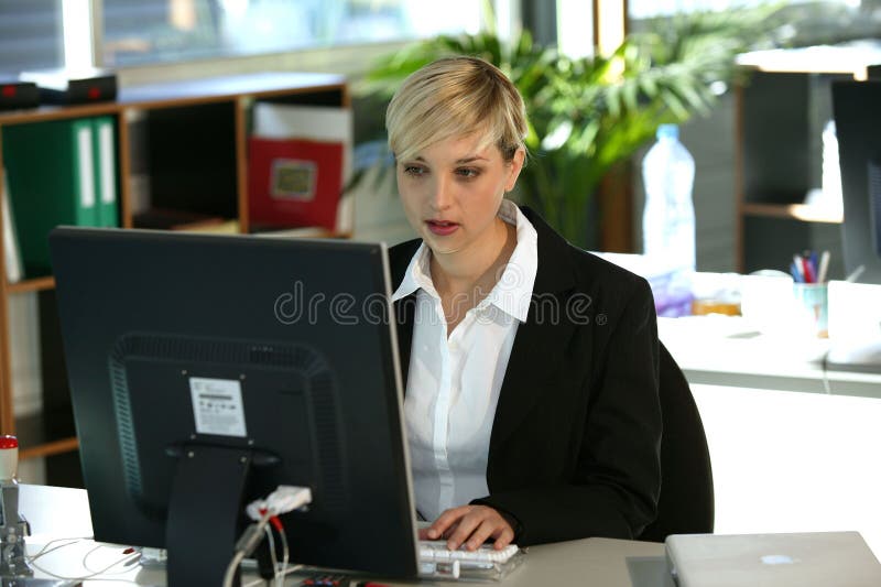 Woman at Desk with Laptop Computer Stock Photo - Image of notebook ...