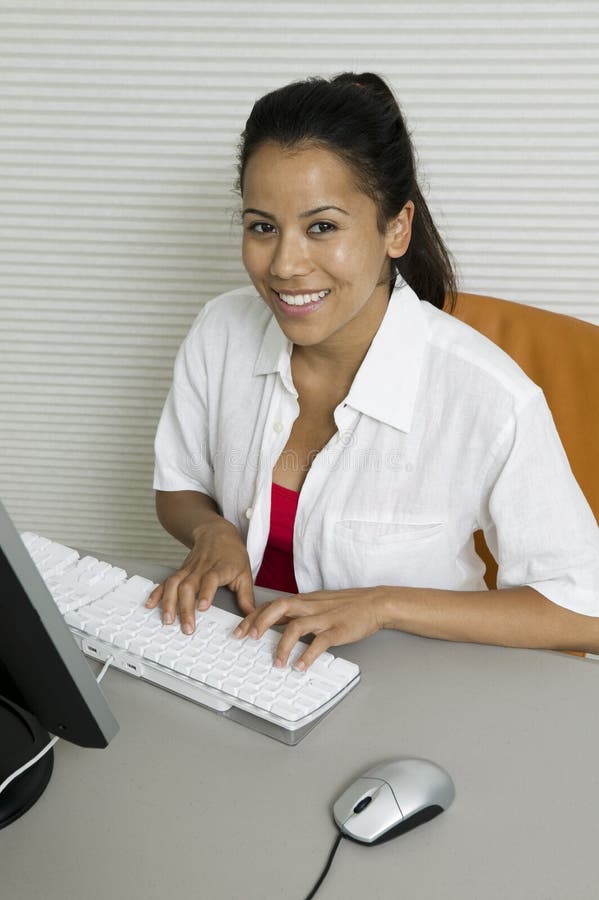 Woman at Desk Using Computer Portrait Stock Image - Image of enjoyment ...