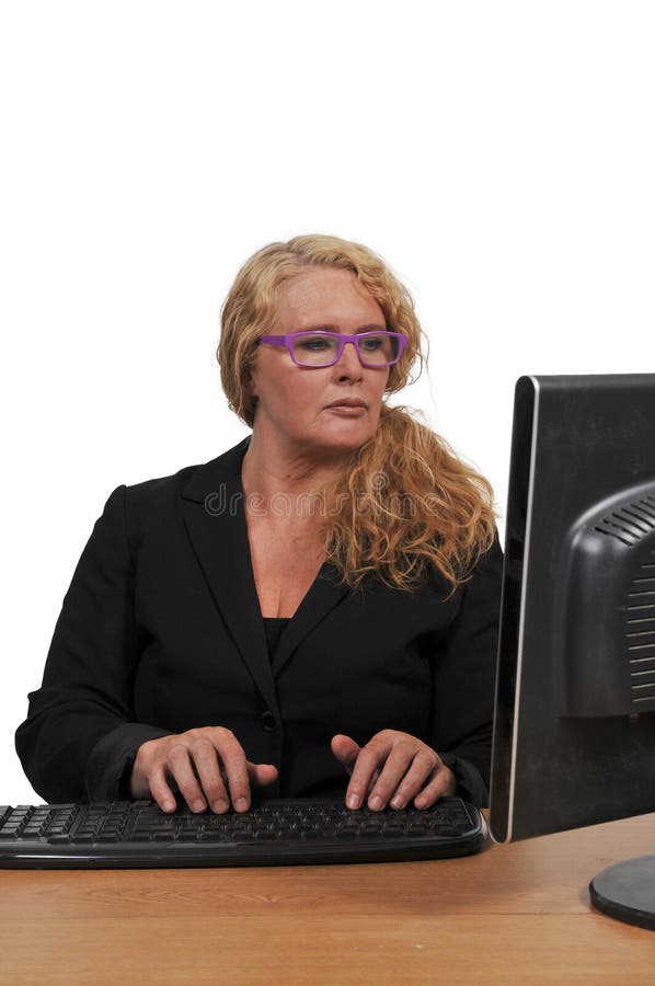 Woman on desktop computer stock image. Image of information - 92625973