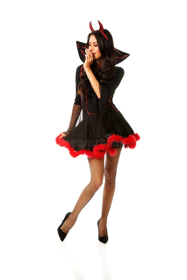 Woman in Devil Clothes Whispering To Someone Stock Photo - Image of ...
