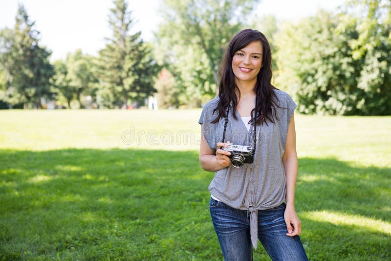 Woman with Digital Camera in Park Stock Photo - Image of female ...