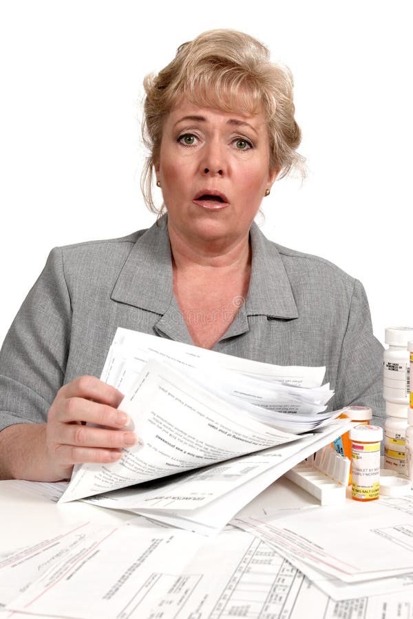Woman Dismayed Over Healthcare Bills Stock Image - Image of caucasian ...