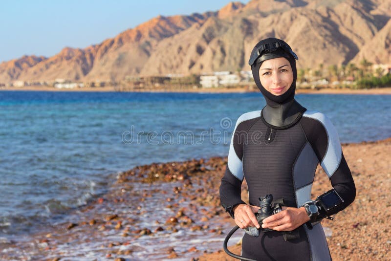 Woman diver stock image. Image of beach, camera, recreational - 26821513