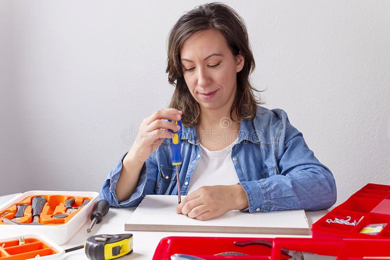 Woman DIY at home stock image. Image of home, clean - 112648565