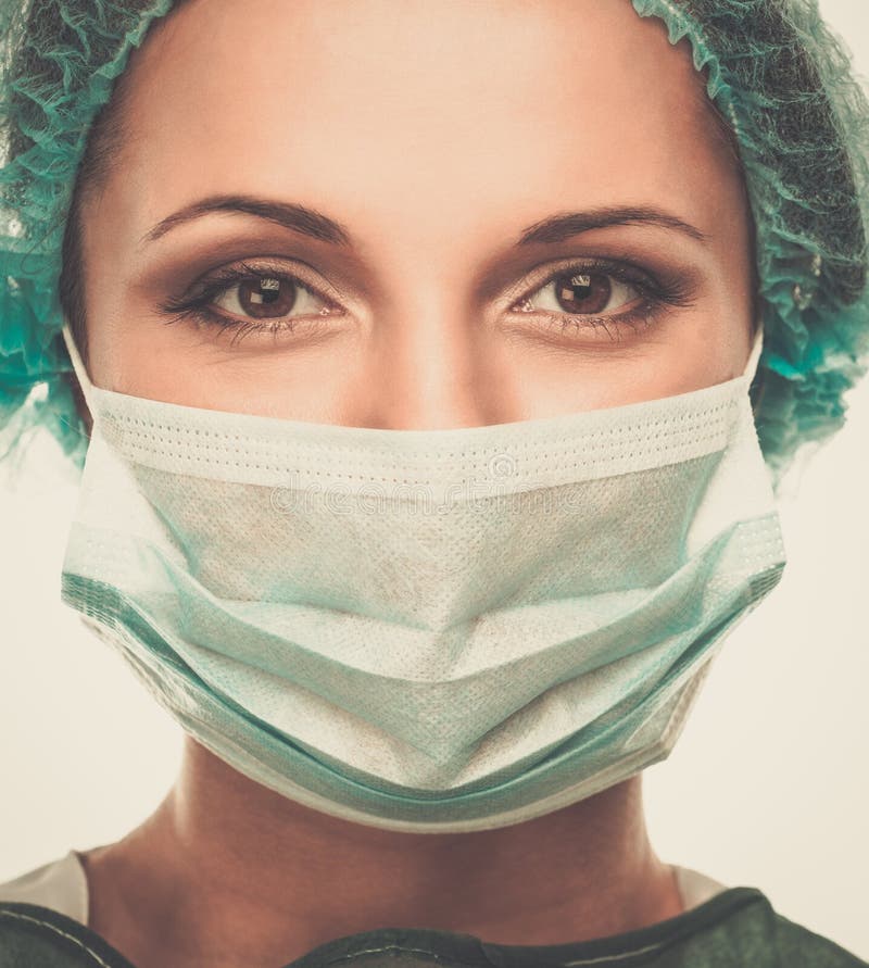 Woman doctor in face mask stock image. Image of emergency - 39359443