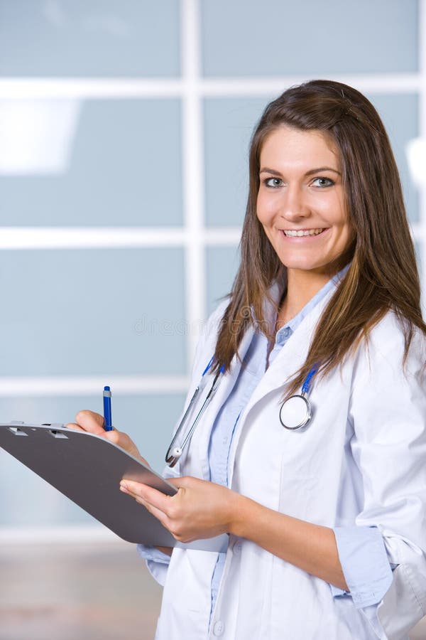 Woman Doctor Holding a Chart Stock Image - Image of normal, girl: 9154915