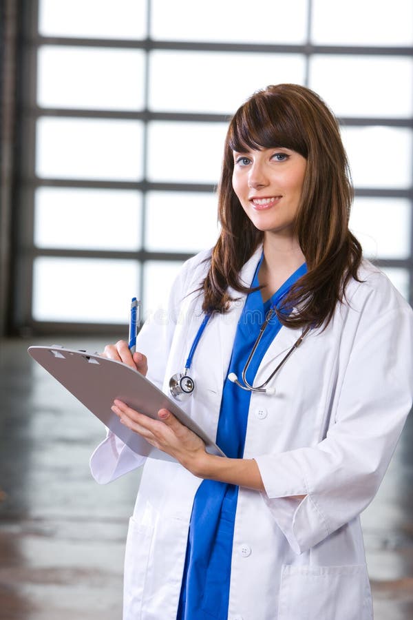 Woman Doctor Holding a Chart Stock Image - Image of normal, caucasian ...