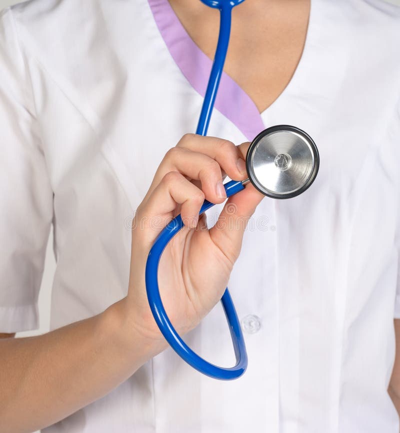 Woman Doctor in Lab Coat Holding Stethoscope Stock Image - Image of ...