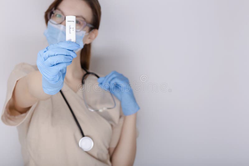 Woman Doctor Shows Rapid Laboratory COVID-19 Test Stock Image - Image ... Woman Doctor Shows Rapid Laboratory COVID-19 Test Stock Image - Image ...