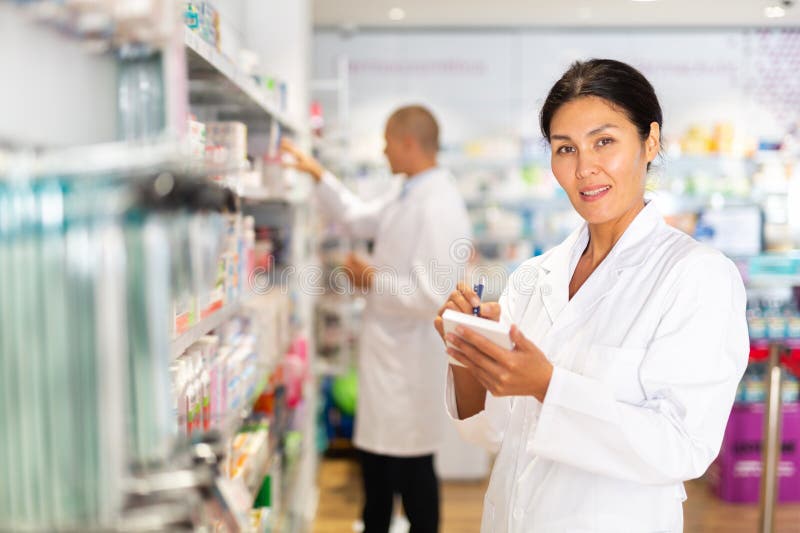 Woman Doctor Standing in Chemist Shop Stock Photo - Image of russian ... Woman Doctor Standing in Chemist Shop Stock Photo - Image of russian ...
