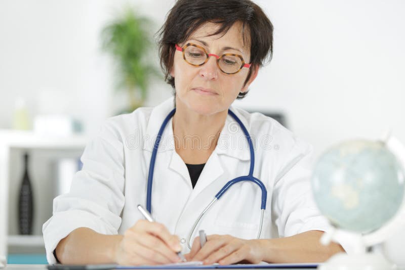 Woman Doctor Take Note on Notebook Stock Image - Image of woman ...