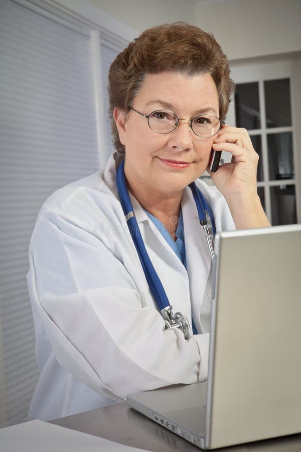 Doctor on Phone Discussing Patient S Spinal Scans Stock Photo - Image ...