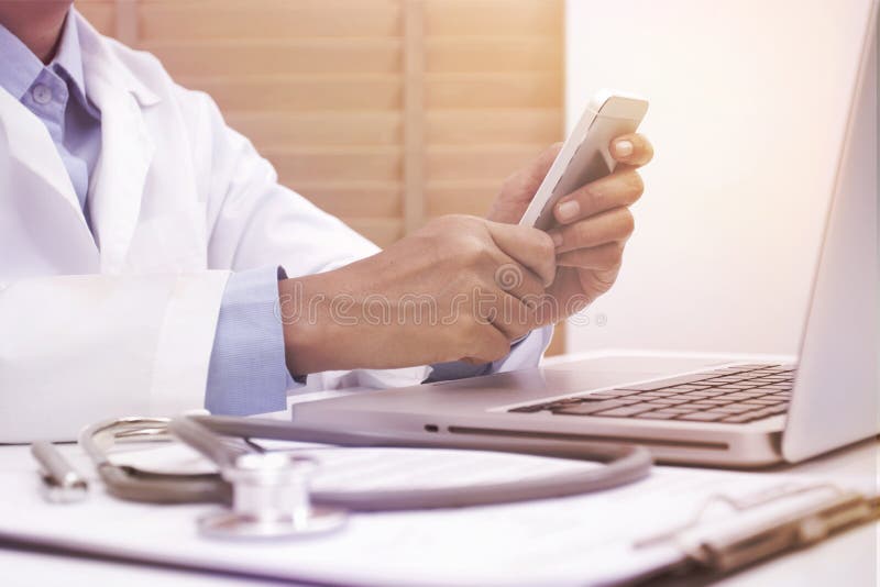 Woman Doctor Using Mobile Smart Phone . Stock Image - Image of care ...