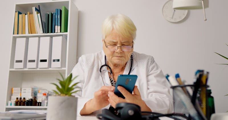 Woman Doctor Using Technology Break Time Stock Photos - Free & Royalty ...
