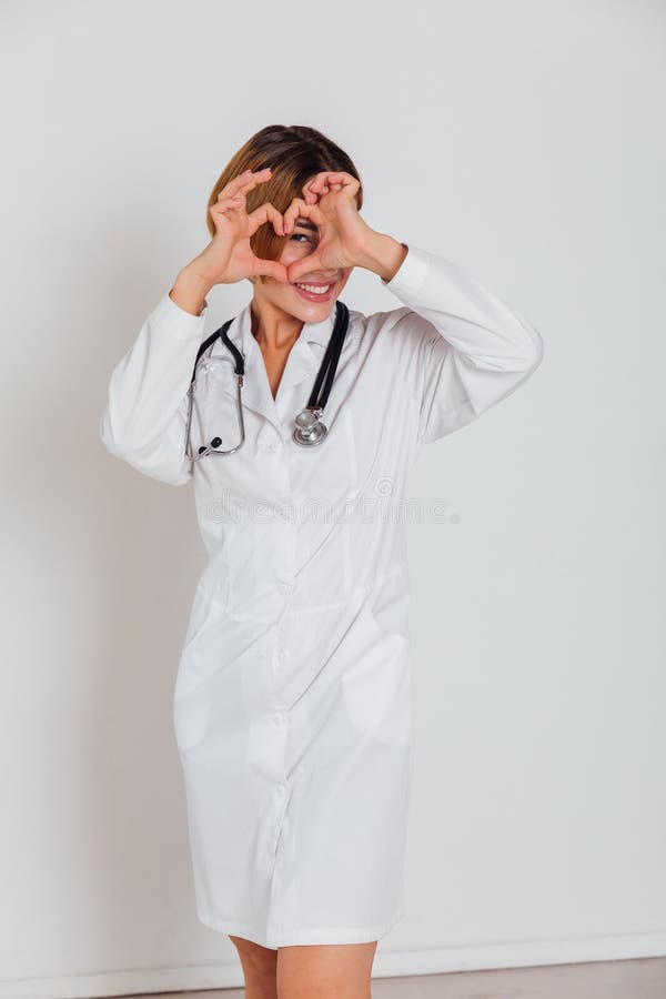 Woman Doctor In White Coat With Phonendoscope Stethoscope In Hospital