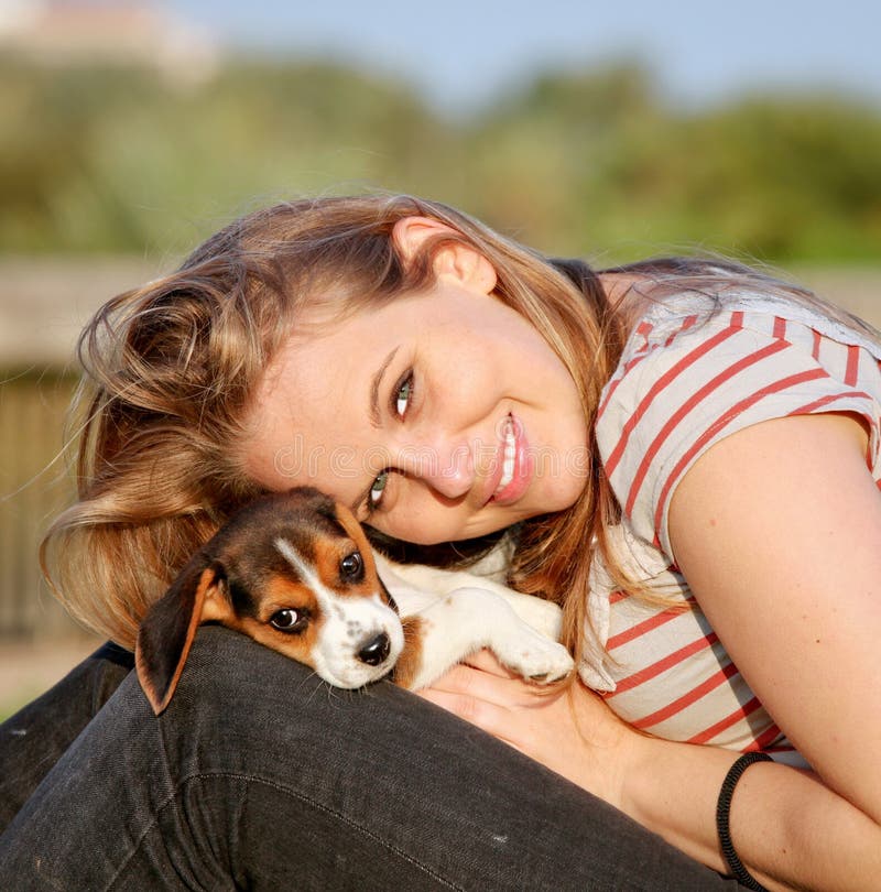 Woman and dog stock image. Image of teen, affection, puppy - 20347281
