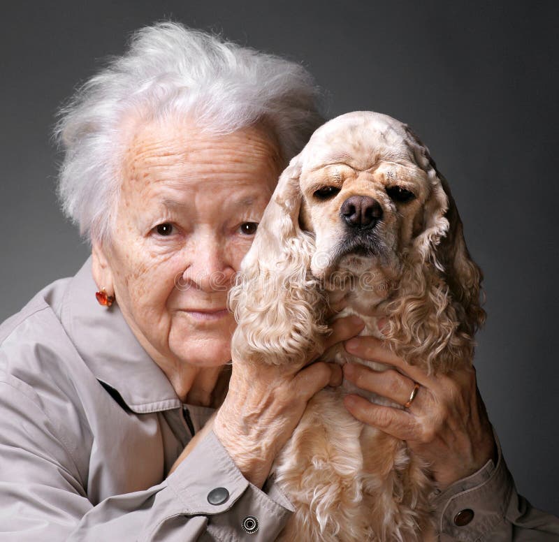 Elderly Caucasian Woman in Bedroom with Dog. Stock Photo - Image of ...
