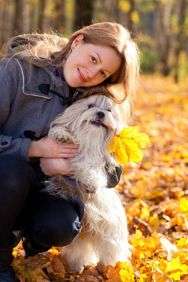 Woman with dog stock image. Image of embrace, shihtzu - 34883577