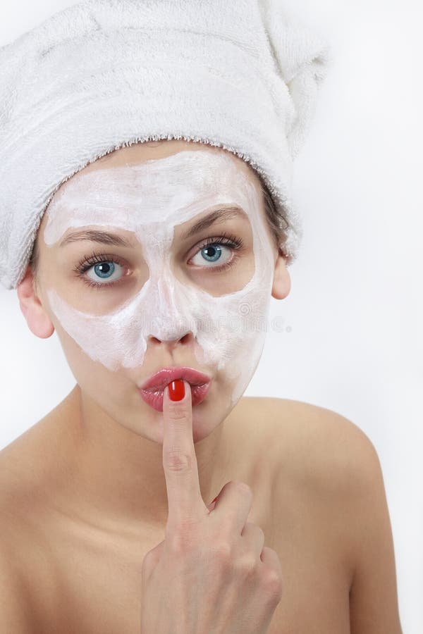 Woman doing cosmetic mask stock photo. Image of ideal - 24104458