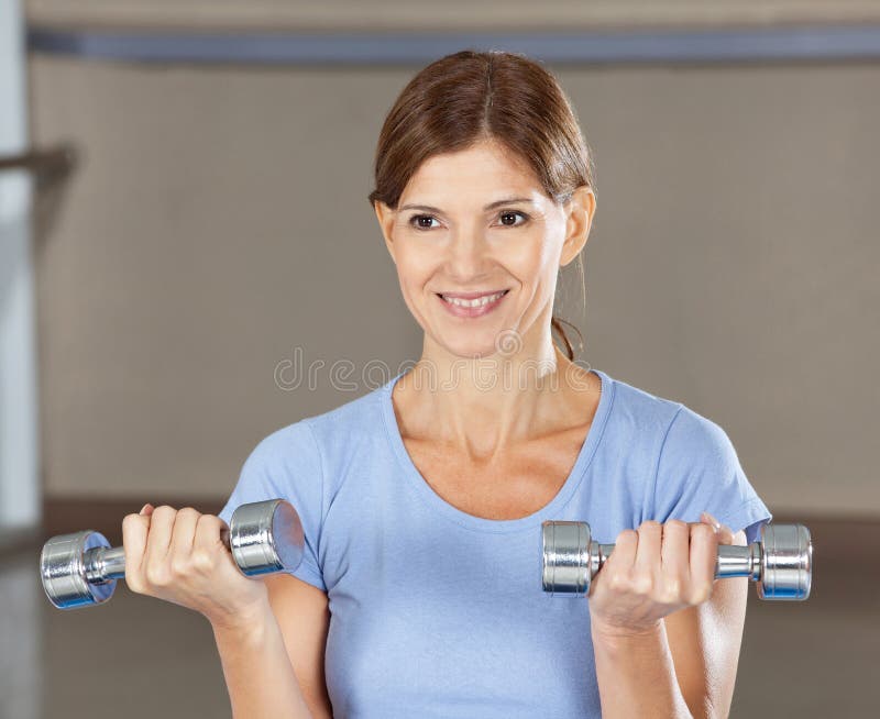 Woman Doing Dumbbell Training Stock Image - Image of pensioner ...