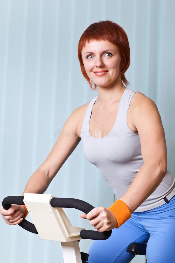 Woman Doing Exercising on Training Apparatus Stock Image - Image of ...