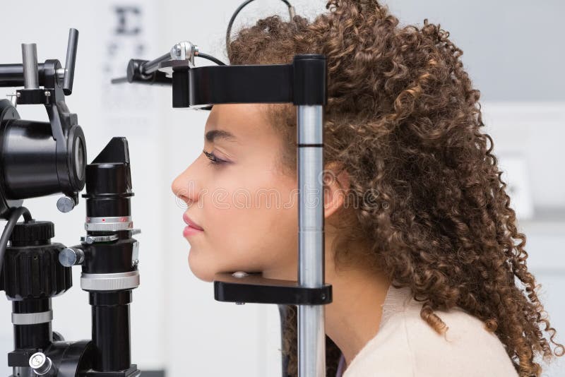 Woman doing eye test stock photo. Image of optometrist - 50491290
