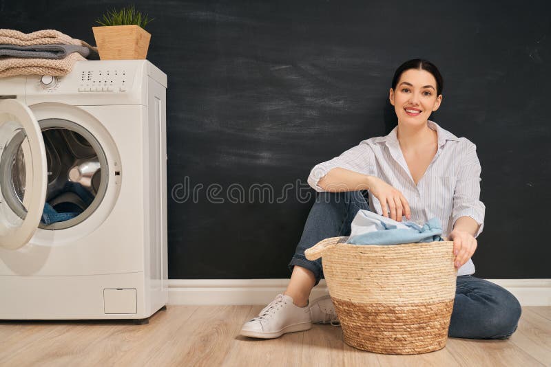 Woman is doing laundry stock image. Image of cleaning - 175933383