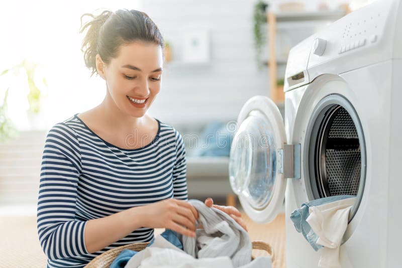 Woman is doing laundry stock image. Image of hygiene - 198037697