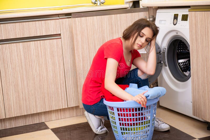The Woman Doing Laundry at Home Stock Image - Image of domestic, chore ...