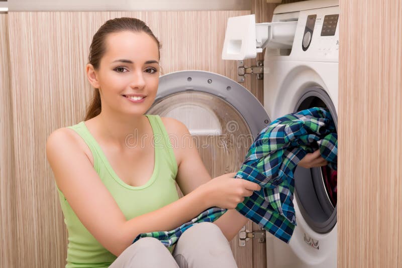 The Woman Doing Laundry at Home Stock Image - Image of happy ...