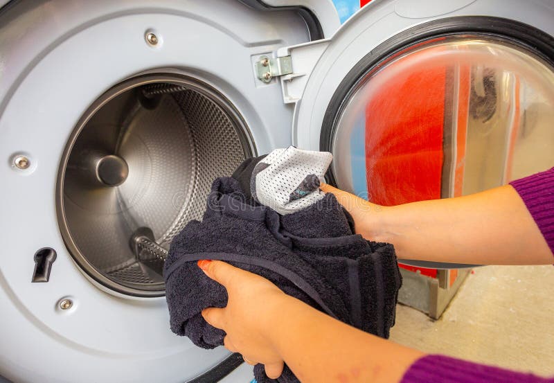 Woman doing laundry stock image. Image of house, drying - 125110945