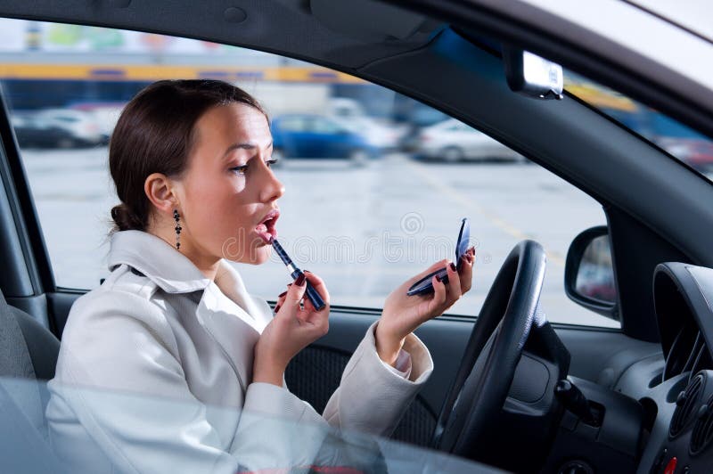 Woman is Doing Makeup on the Run in Car Stock Photo - Image of driver ...