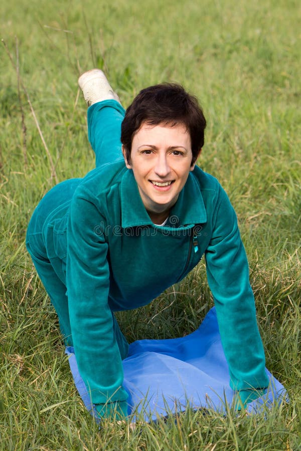 Woman Doing Pilates in the Park Stock Image - Image of yoga, garden ...