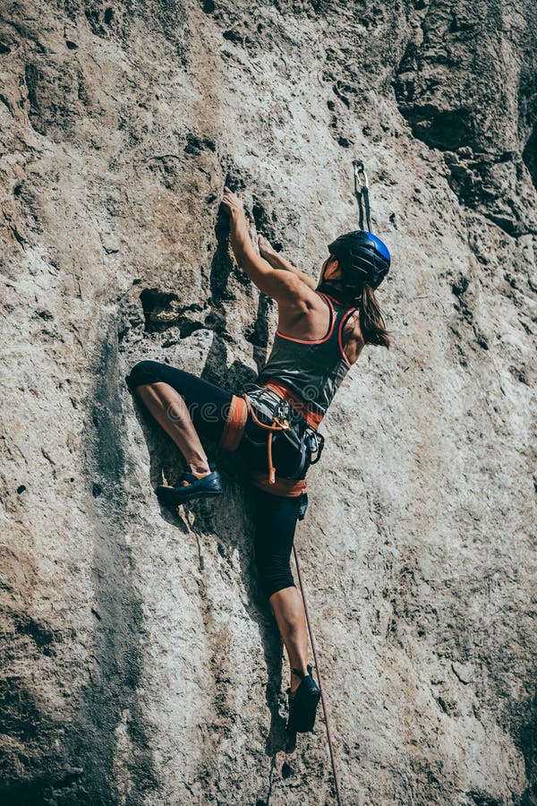 Woman Doing Rock Climbing in a Wall Stock Image - Image of rock ...
