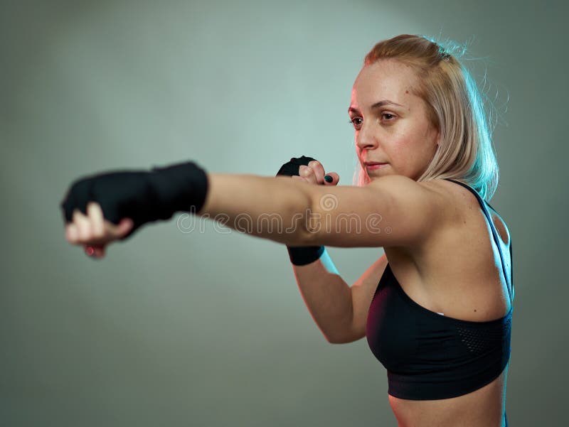 Woman doing shadow boxing stock image. Image of combat - 170915551