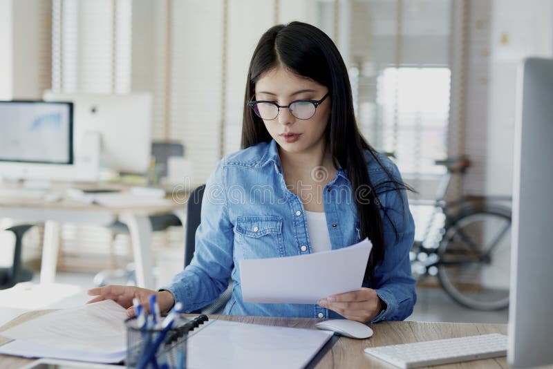Woman Doing Some Paper Work Stock Photo - Image of desk, paperwork ...