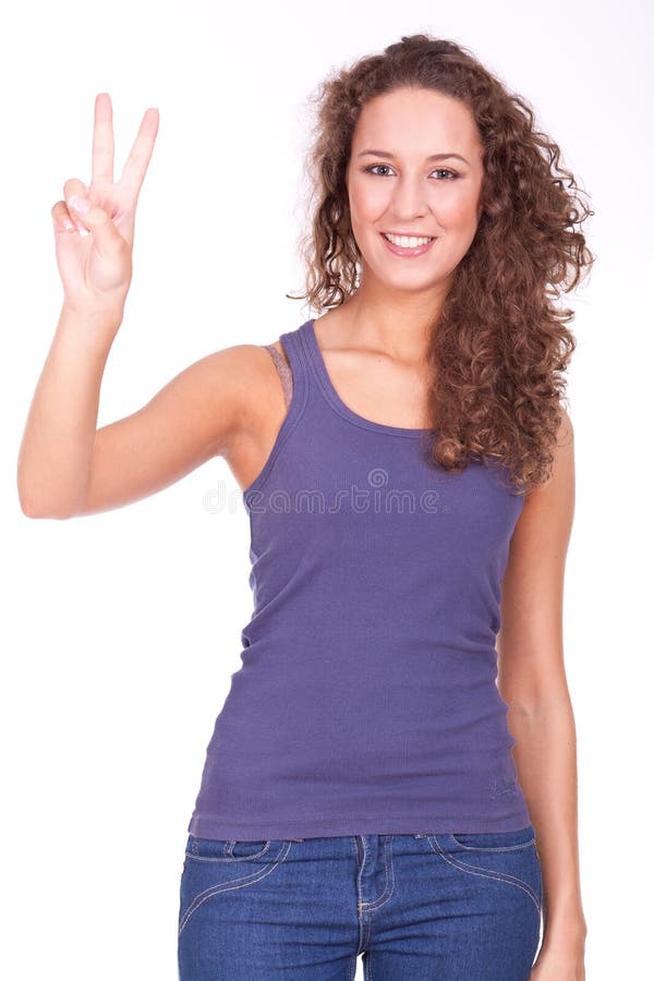 Woman doing victory sign stock image. Image of female - 26054503