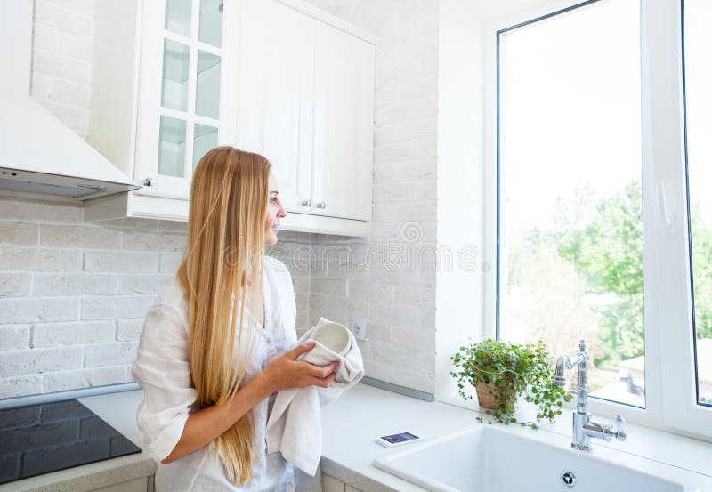 Woman Doing the Washing Up in the Kitchen Stock Image - Image of ...
