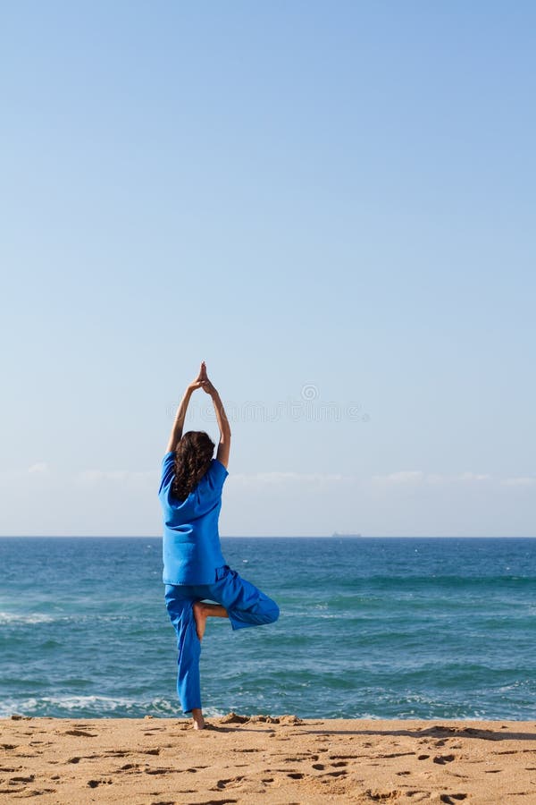 Woman yoga beach stock photo. Image of adult, hands, arms - 10889068