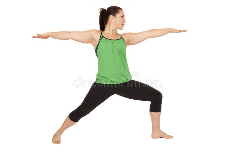 Woman Doing Yoga Pose Called Warrior 2 Arms Out Stock Photo - Image of ...