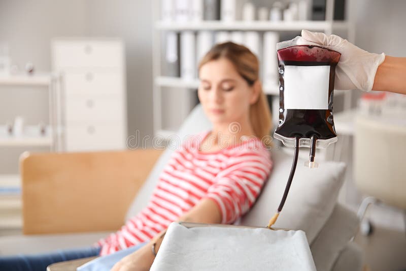 Woman Donating Blood in Hospital Stock Photo - Image of bank, donate ...
