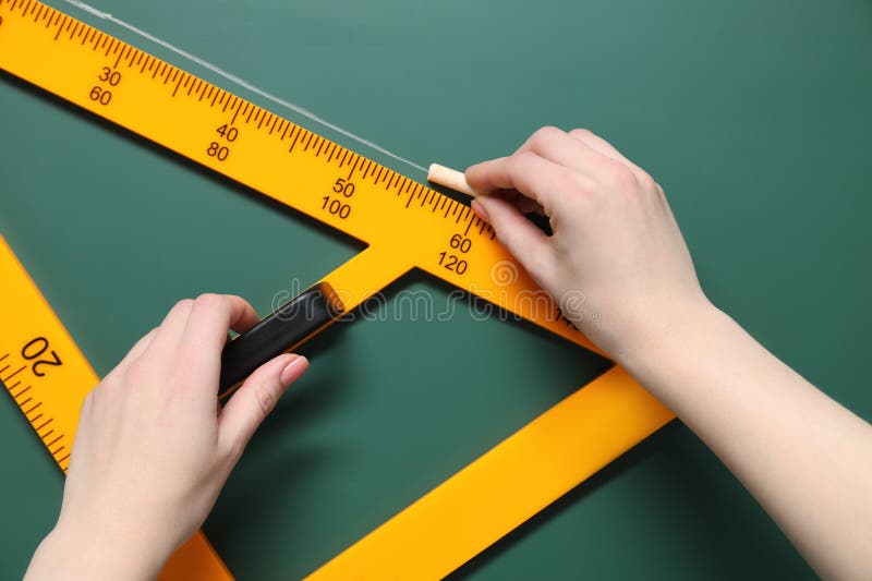 Woman Drawing with Chalk and Triangle Ruler on Green Board, Closeup ...