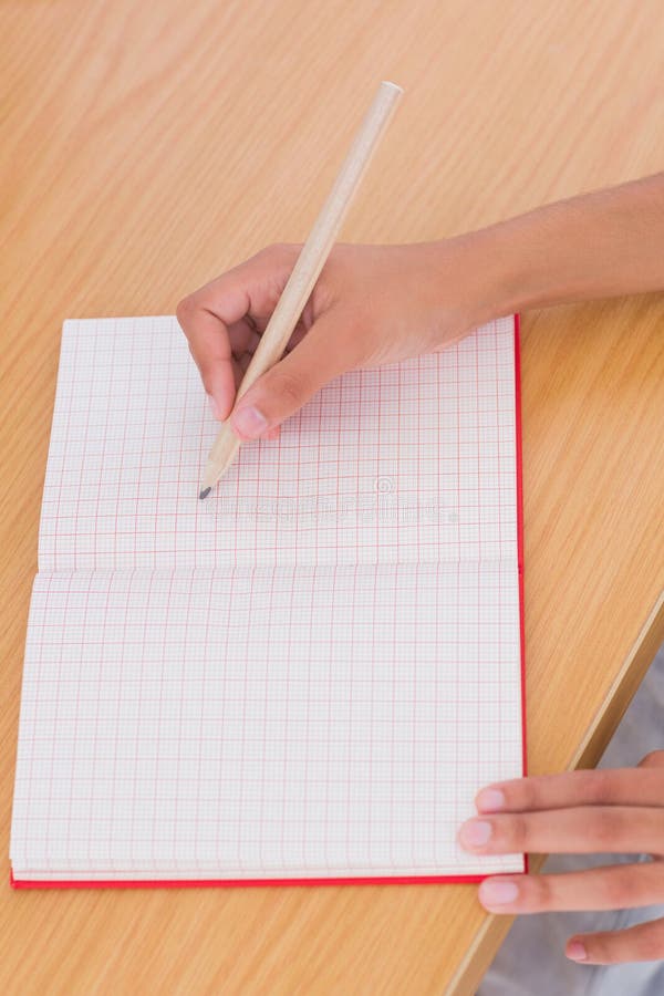Woman Drawing on a Paper with a Pencil Stock Photo - Image of ...