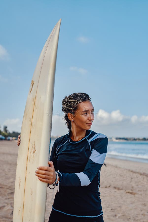 Woman with Dreadlocks and Surfboad on Beach Stock Image - Image of ...
